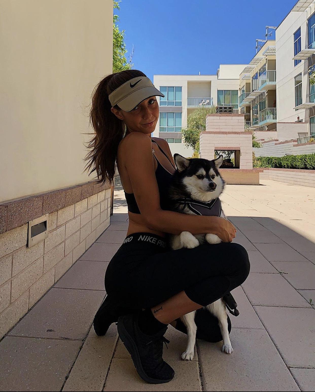 With her dog | Scrolller