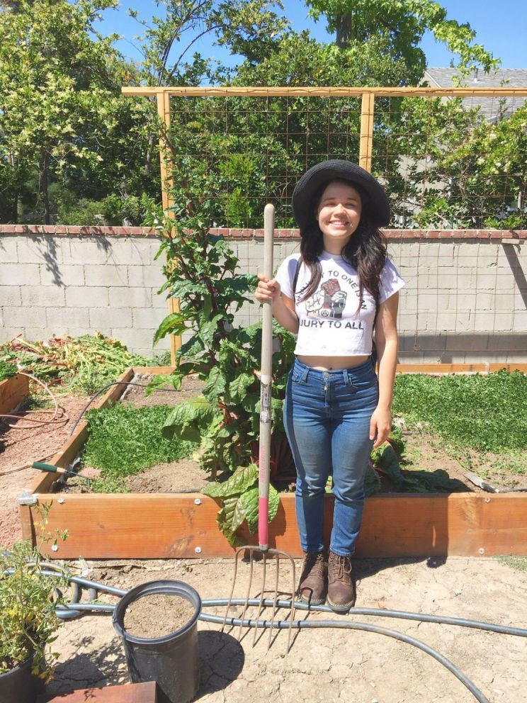 Yhivi enjoying some gardening | Scrolller