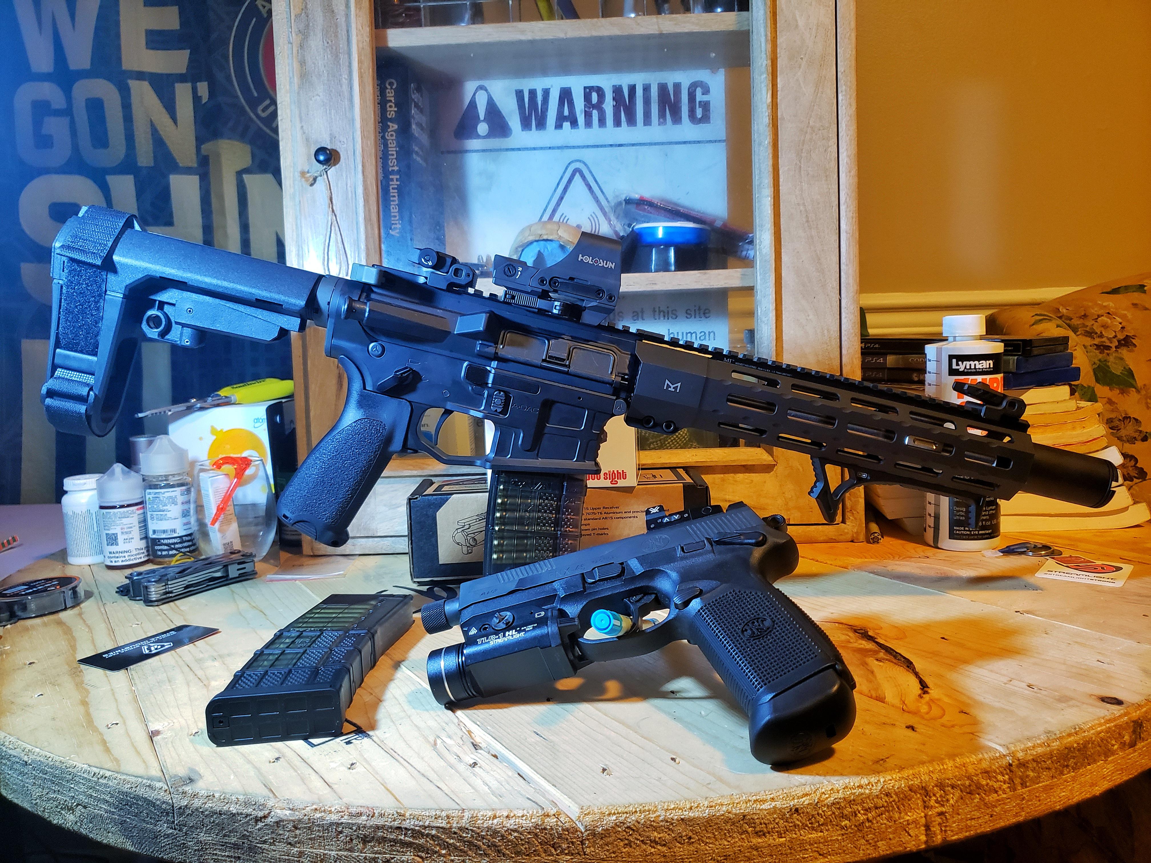 2 pistols 1 cup. Tacticool fn 45 & ar15 pistol | Scrolller