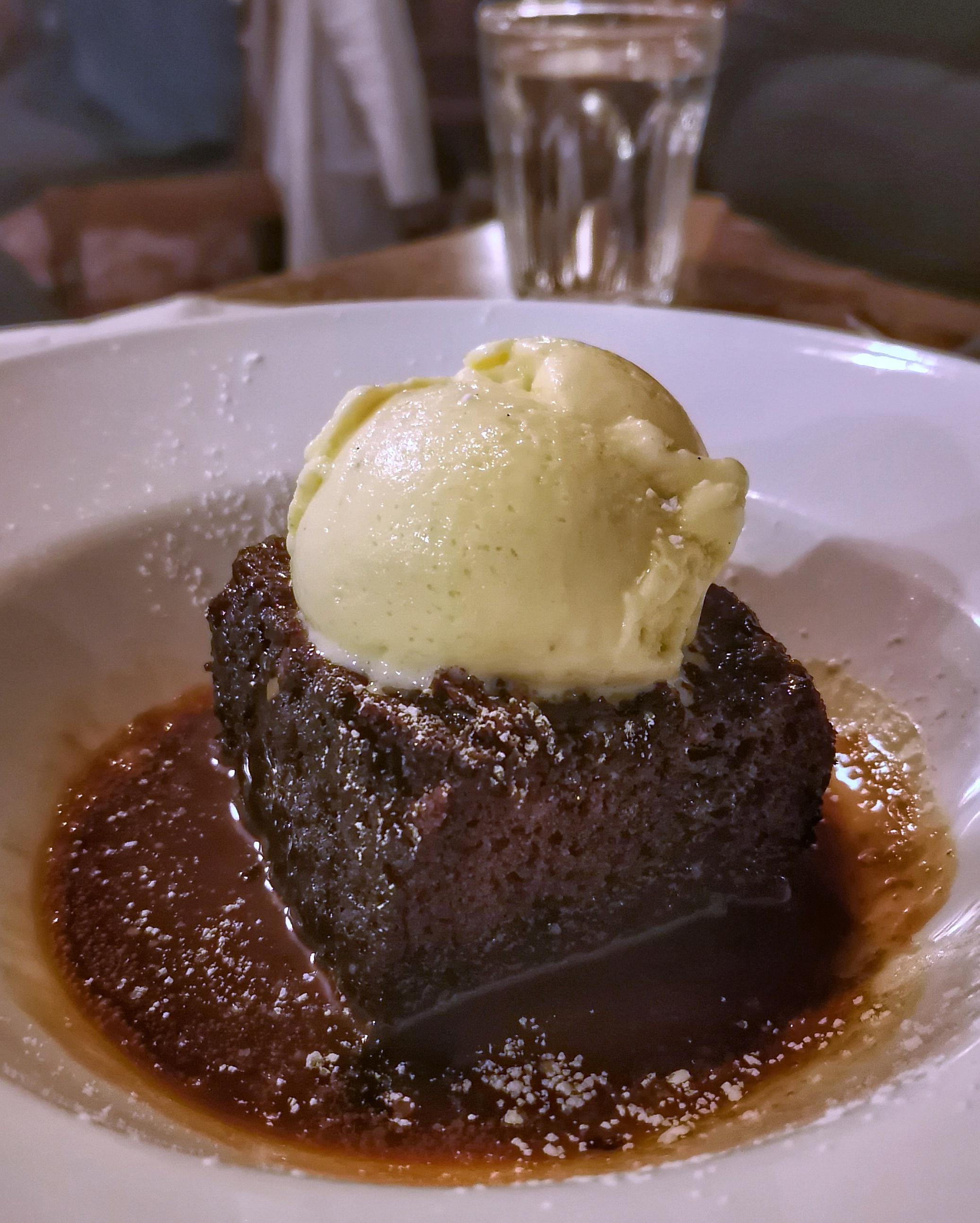 A classic Sticky Toffee Pudding with Vanilla Ice Cream | Scrolller