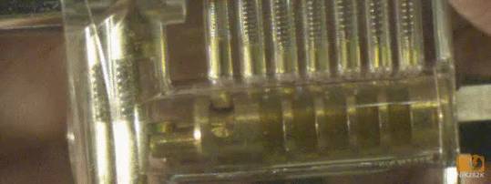 A slow motion look inside a bumped lock. | Scrolller