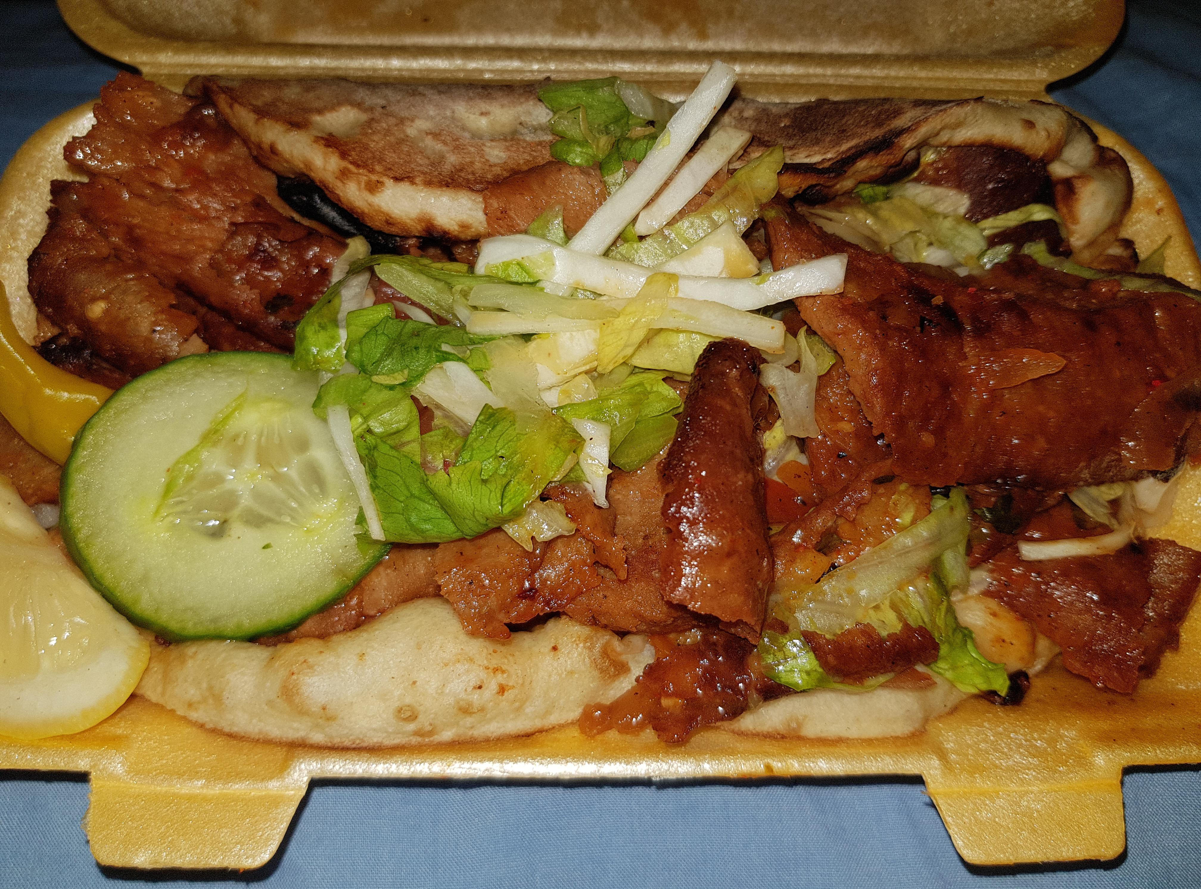 A spicy lamb doner with naan and a bit of salad a while back from my gallery. | Scrolller