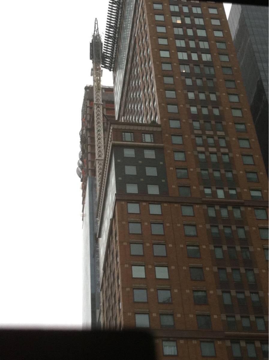 A view from my hotel room of the broken crane dangling off One57 in Midtown. | Scrolller