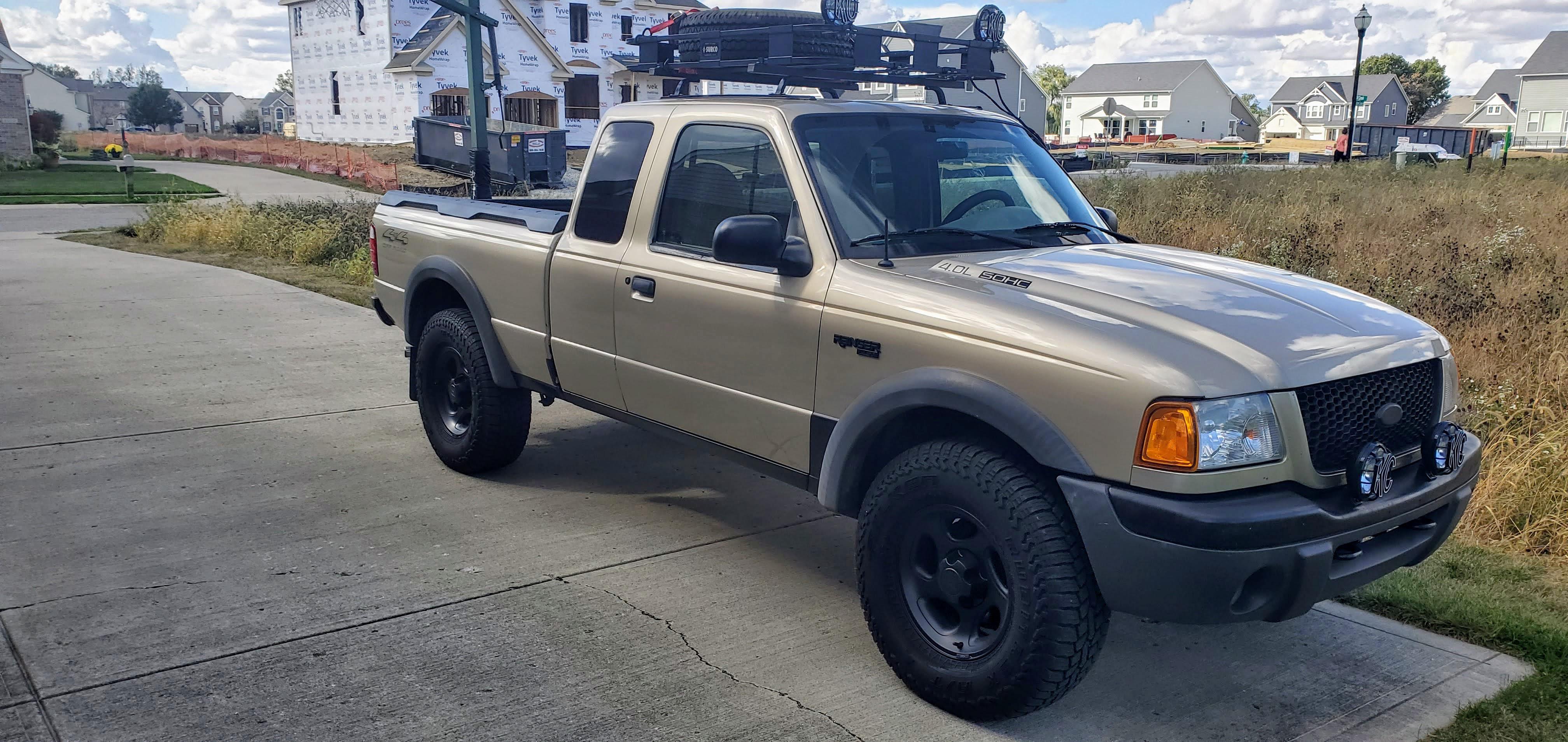 Added some Plasti dip to the wheels and rocker panels | Scrolller