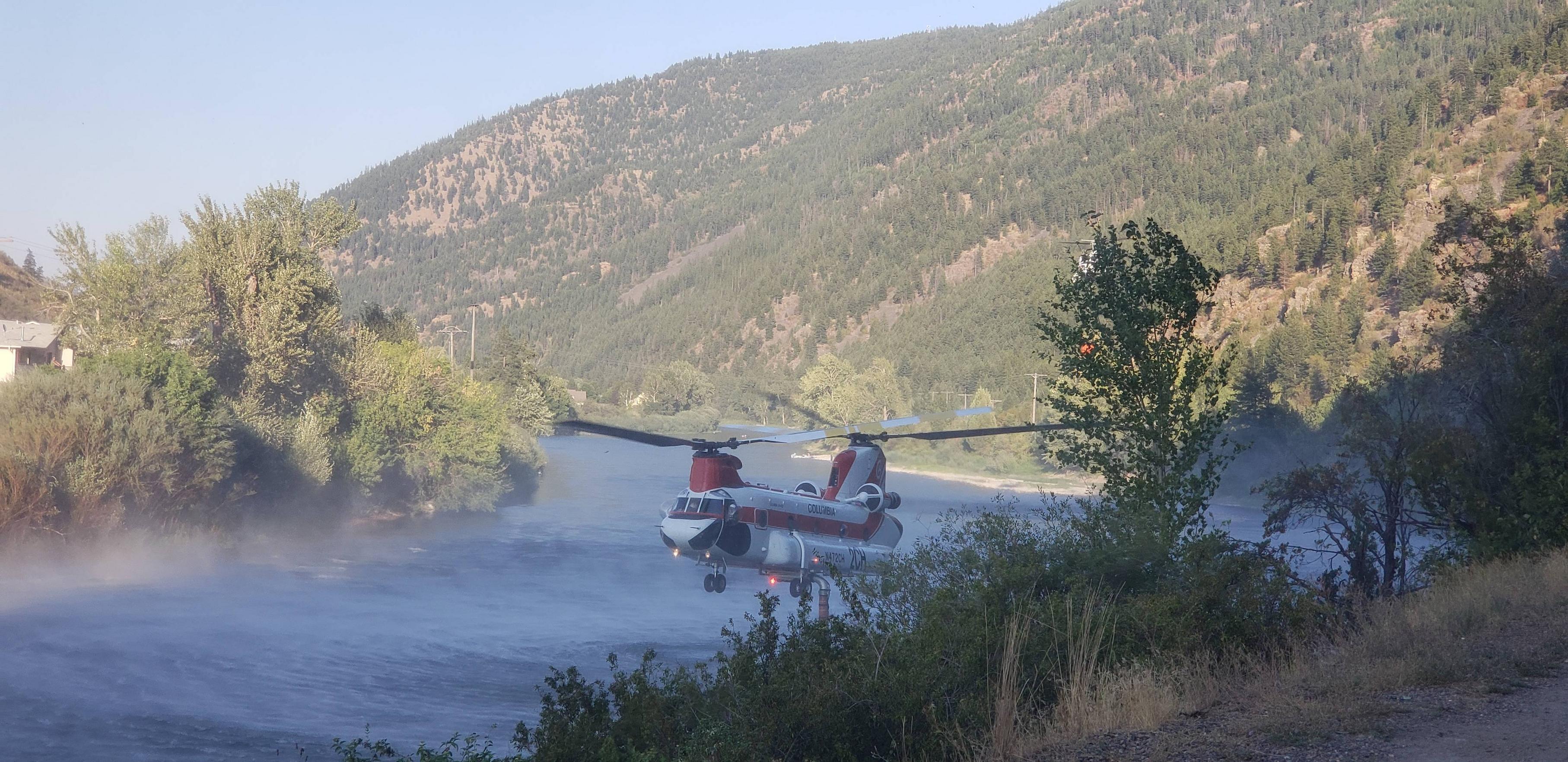 Amazing helicopter crews fighting Mt Sentinel Fire | Scrolller