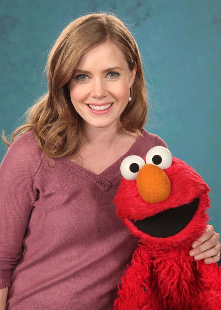 Amy and Elmo | Scrolller