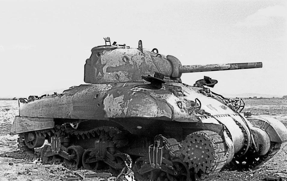 An M4A1 Sherman with visible side penetrations knocked out in Tunisia, February 1943 | Scrolller