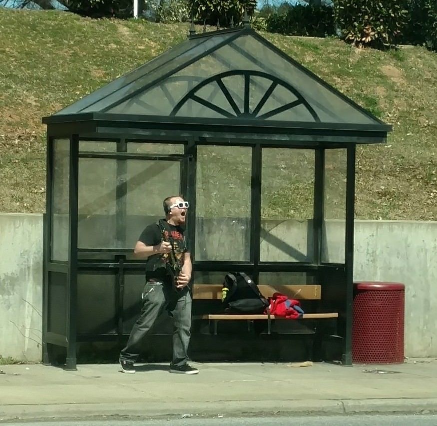Asheville bus stop rock star | Scrolller