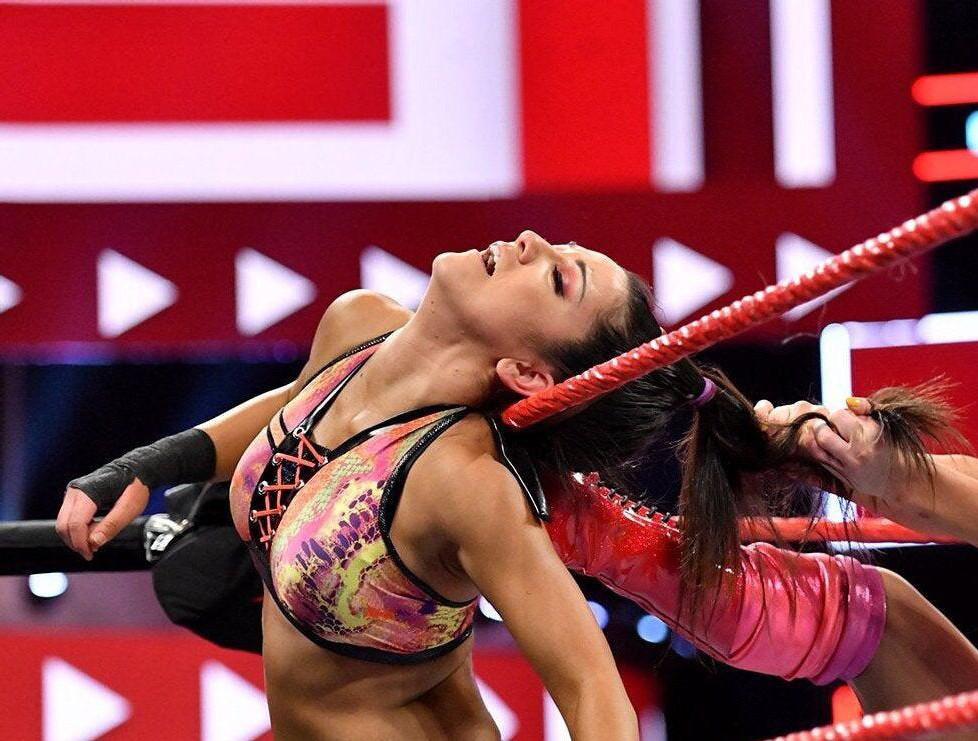 Bayley having her hair pulled | Scrolller