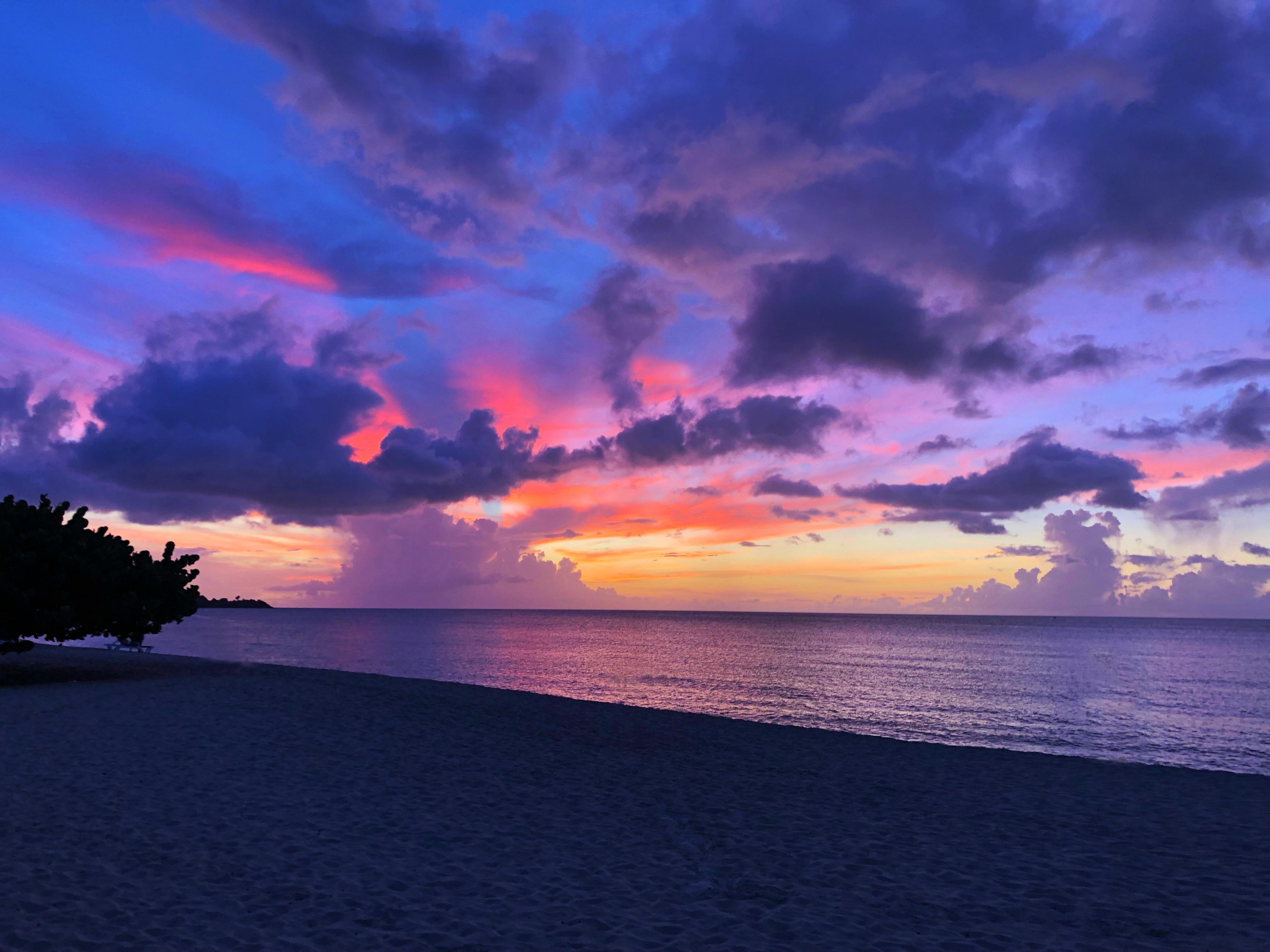 Beautiful sunset in St. George’s, Grenada. Nothing beats Caribbean sunsets! | Scrolller