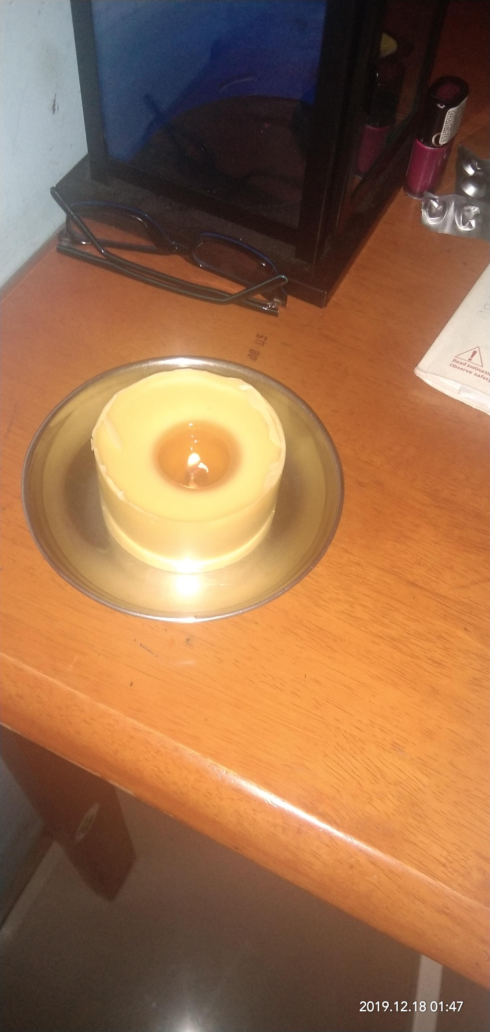 Beeswax candle | Scrolller