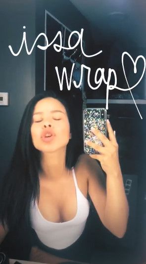 Bending over showing down her top | Scrolller