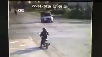 Biker doesn't give a damn about weird traffic accident | Scrolller