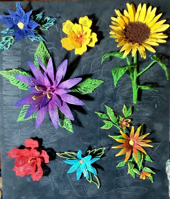 Blooms are a poppin. These are all PLA based, then painted with acrylic. Some will become hair ...