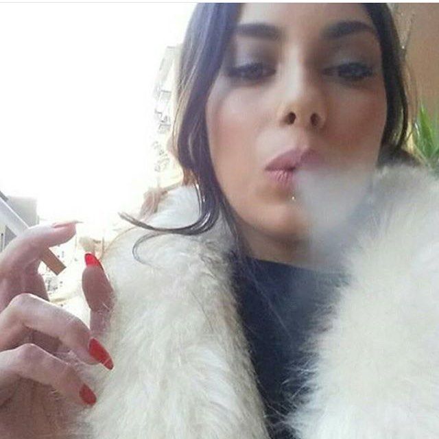 Blowing smoke | Scrolller