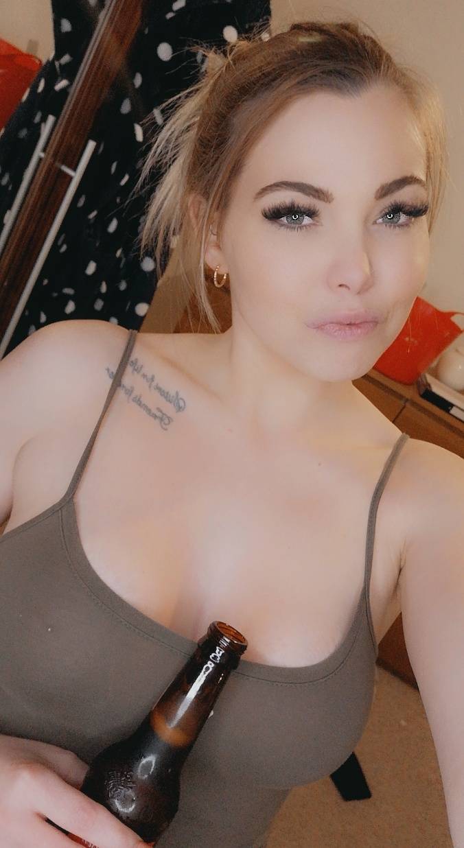 Bra off, hair up and beer in hand. I don't mind having to stay in sometimes 😜 | Scrolller