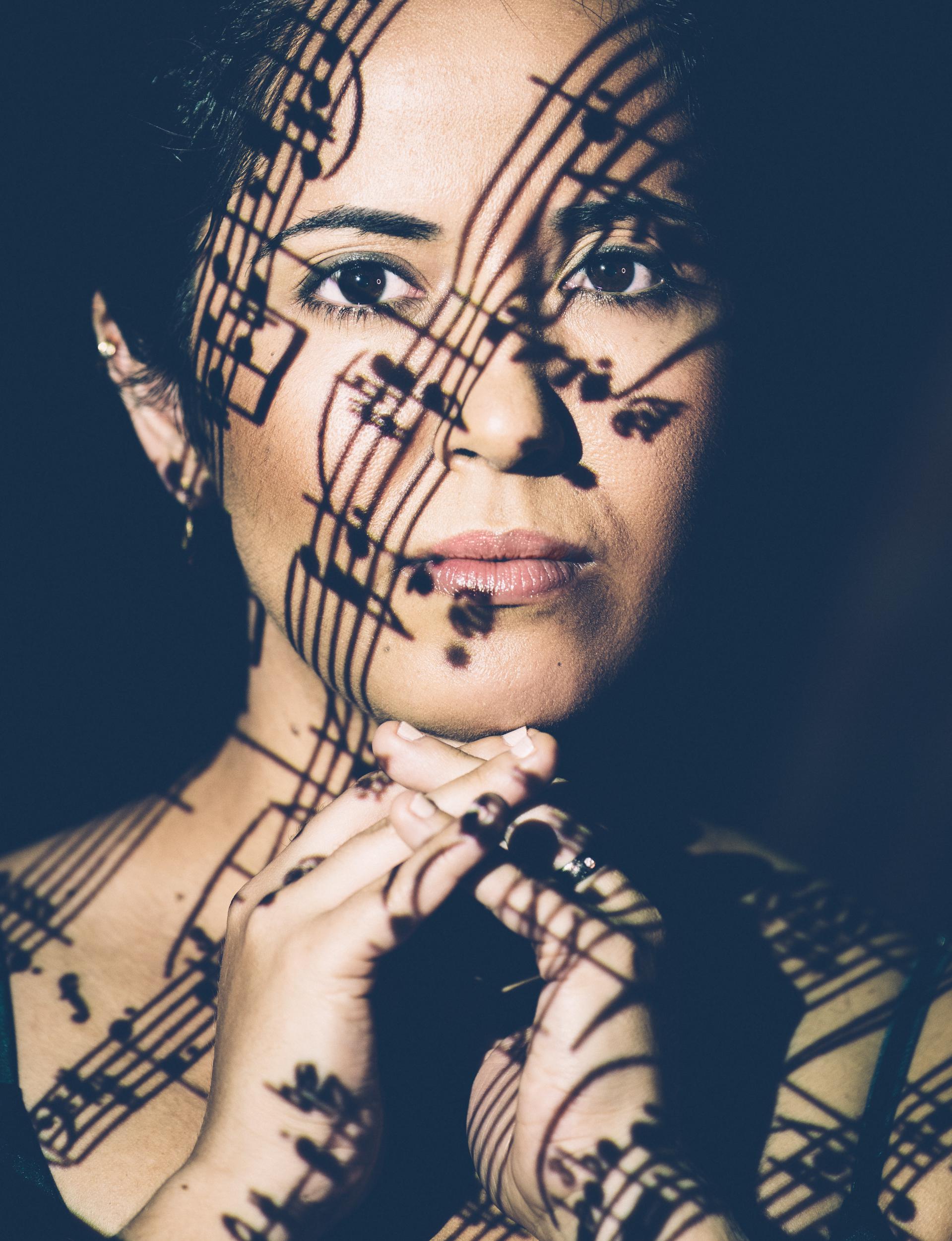 Brazilian Concert Pianist Camila Oliveira with Digital Projections | Scrolller
