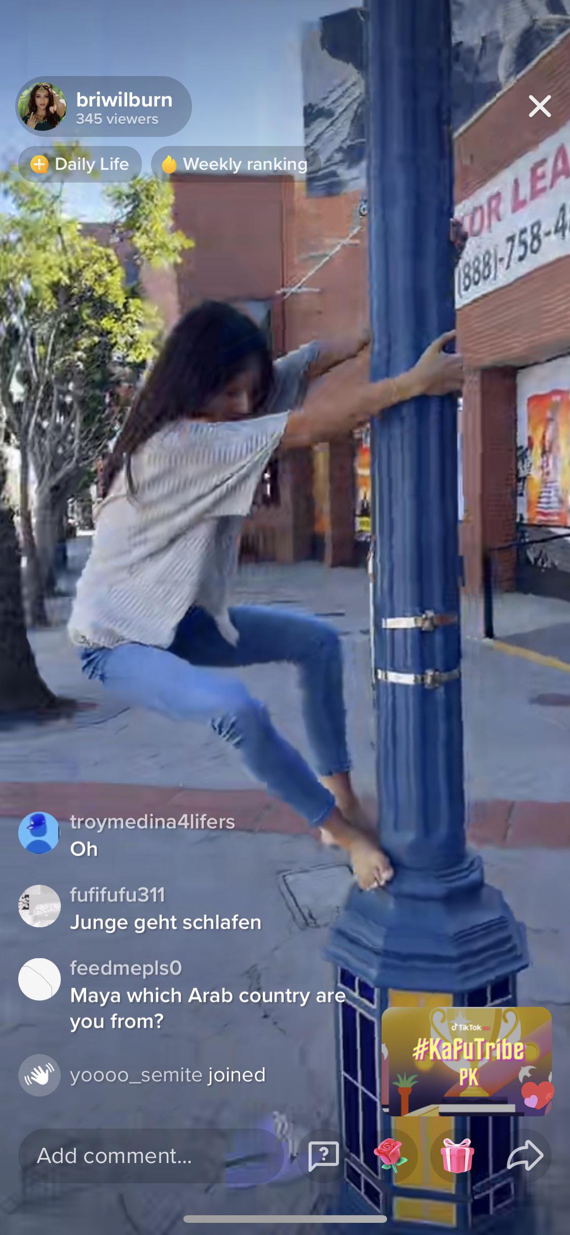 Bri climbing the pole | Scrolller