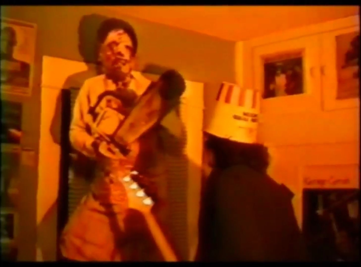 Buckethead hanging with Leatherface | Scrolller