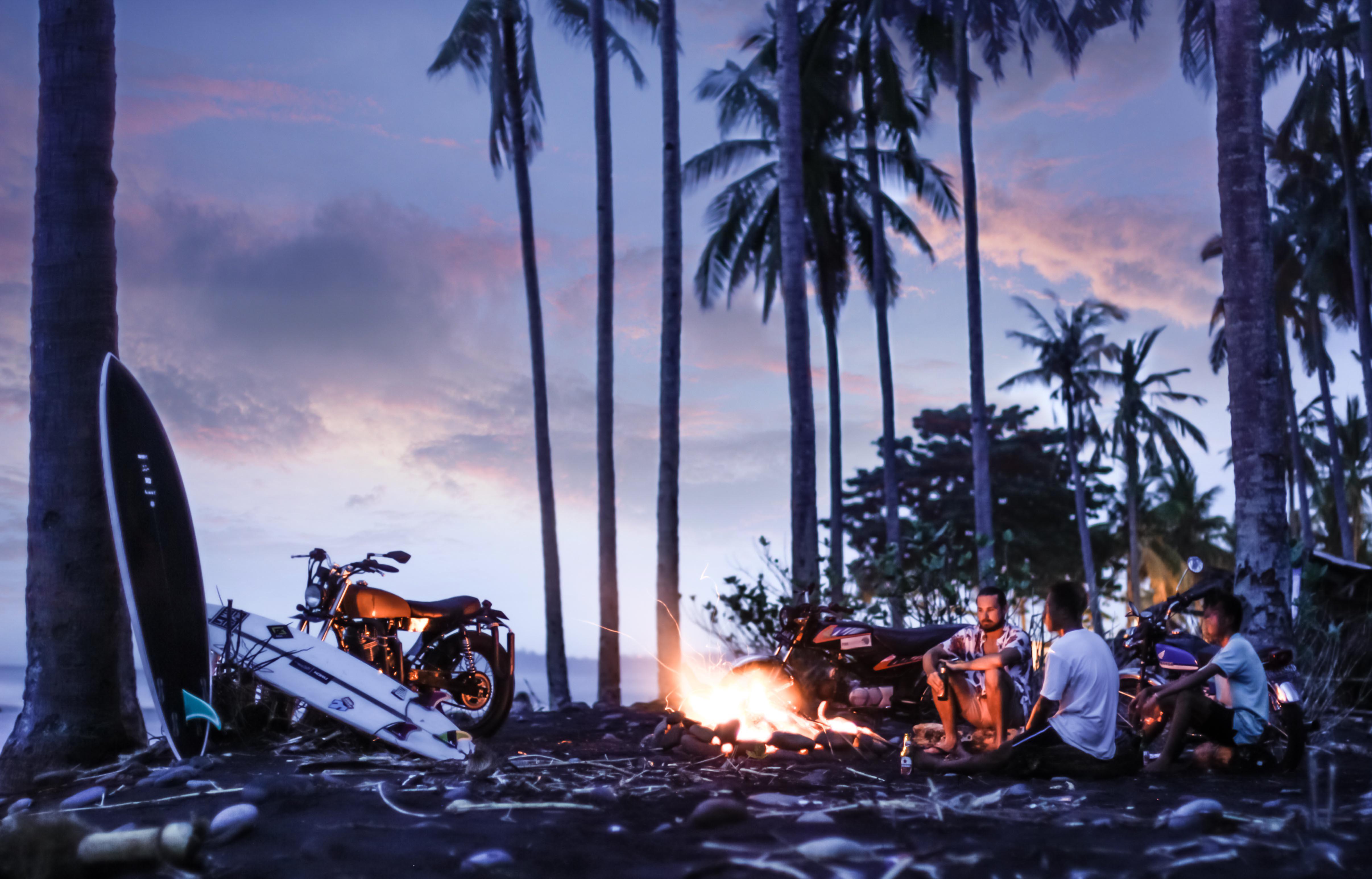Burning one down. Medewi beach, Bali. | Scrolller