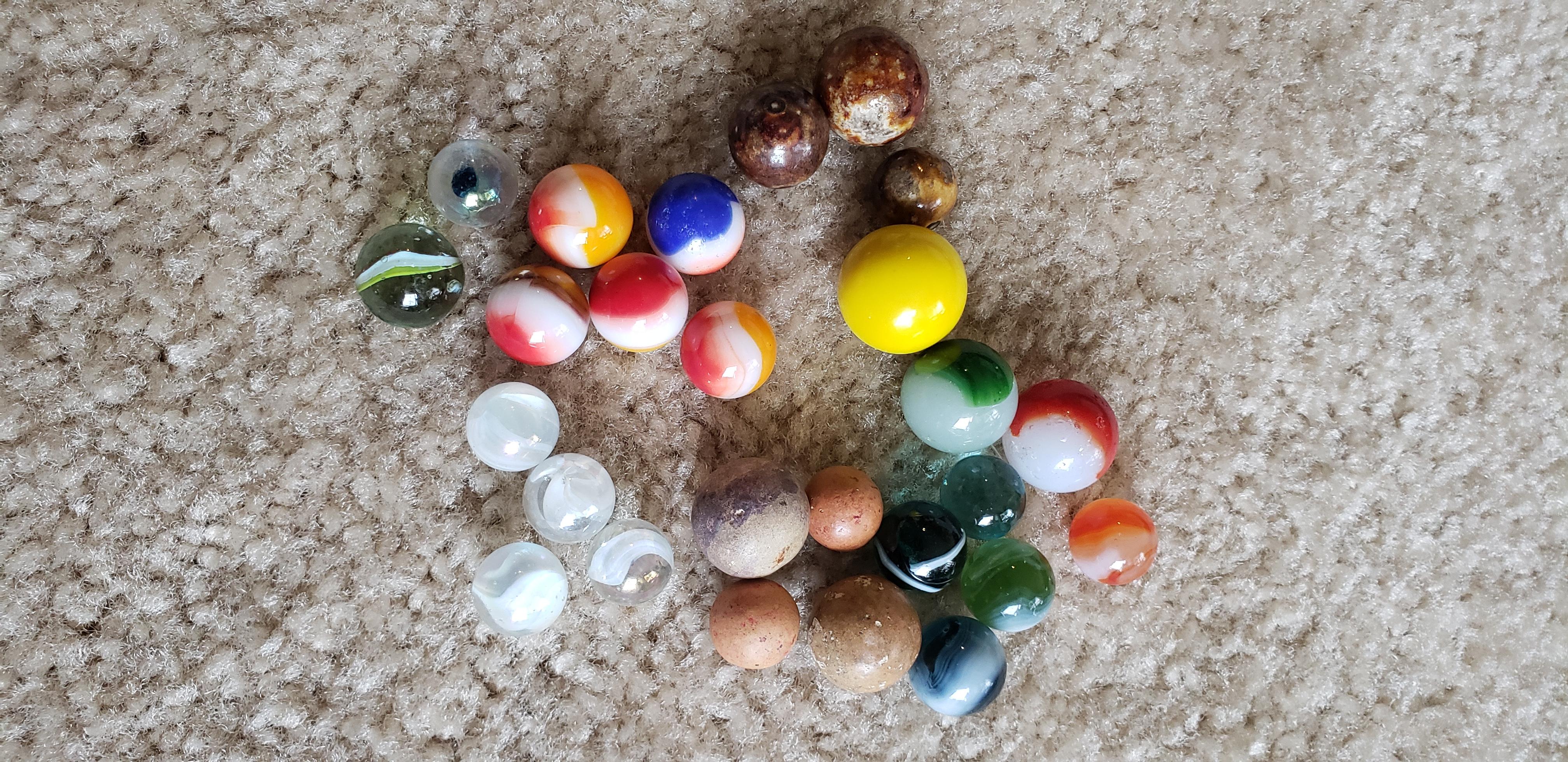 Can anyone identify how old these marbles are? Given to my grandmother by her mother in 1989 ...