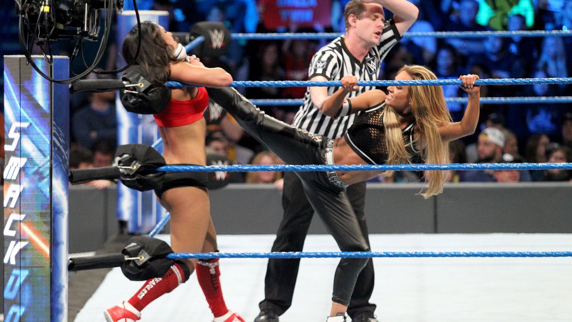 Carmella choking Nikki Bella | Scrolller