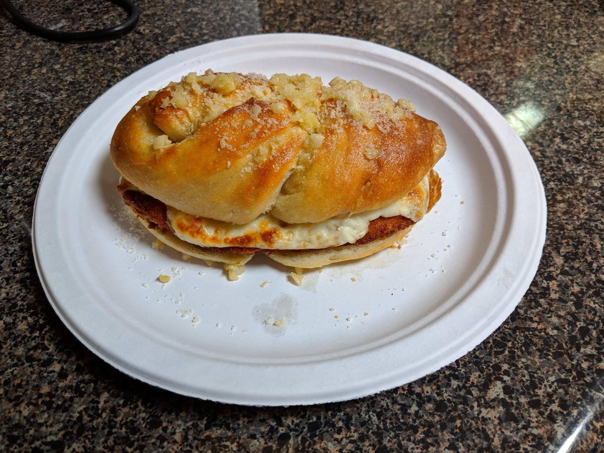 Chicken parm inside an oversized garlic knot | Scrolller