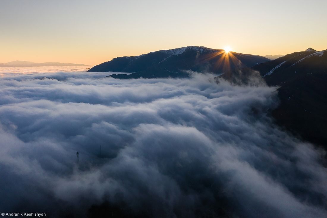 Cloudy mountains | Scrolller