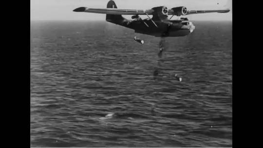 Consolidated PBY Catalina of RAF Coastal Command dropping depth charges at low level | Scrolller