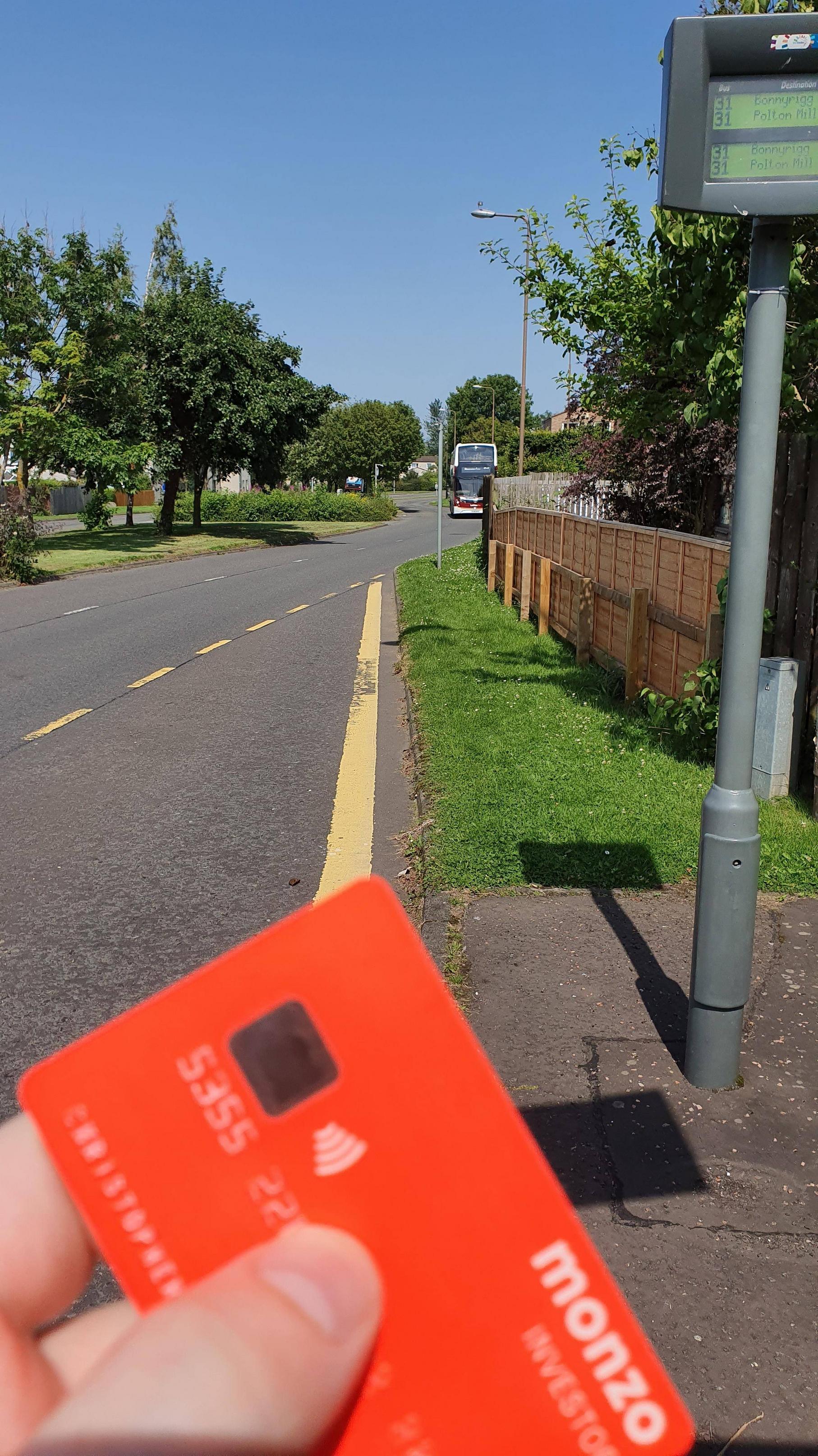 Contactless card in hand, a bus approaches... | Scrolller