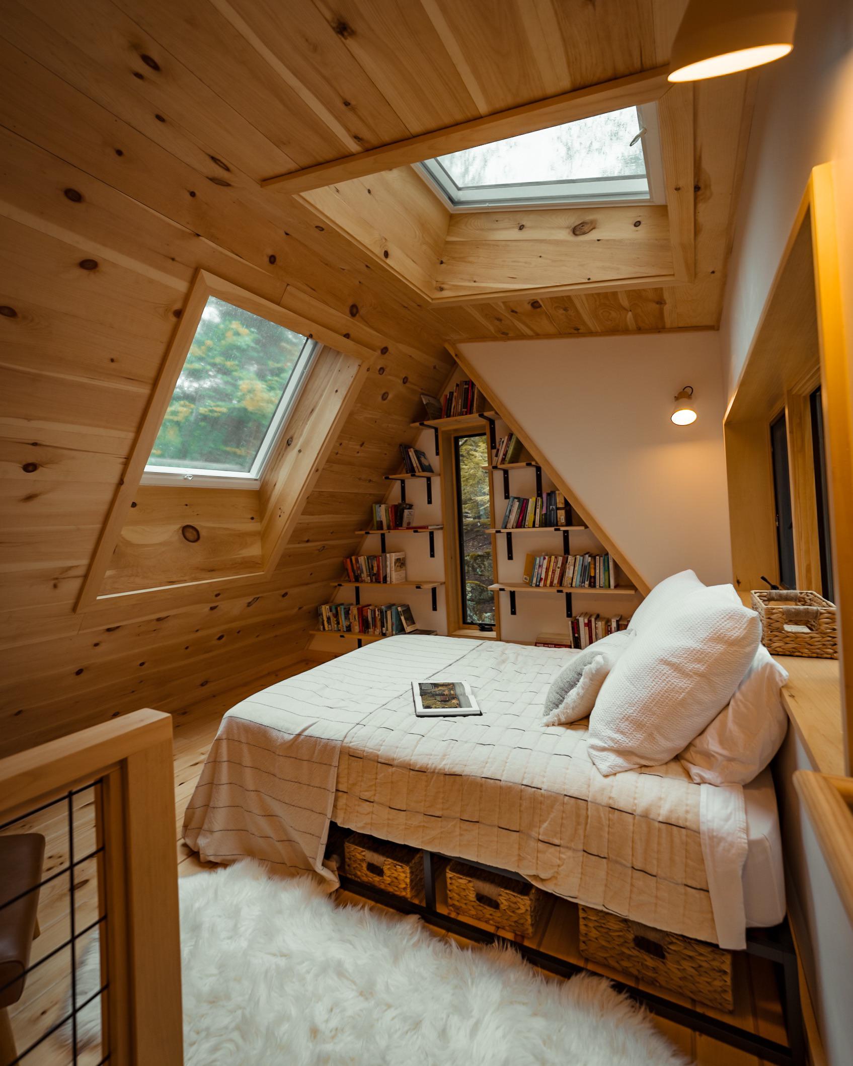 Cozy Loft Bedroom with Skylights | Scrolller