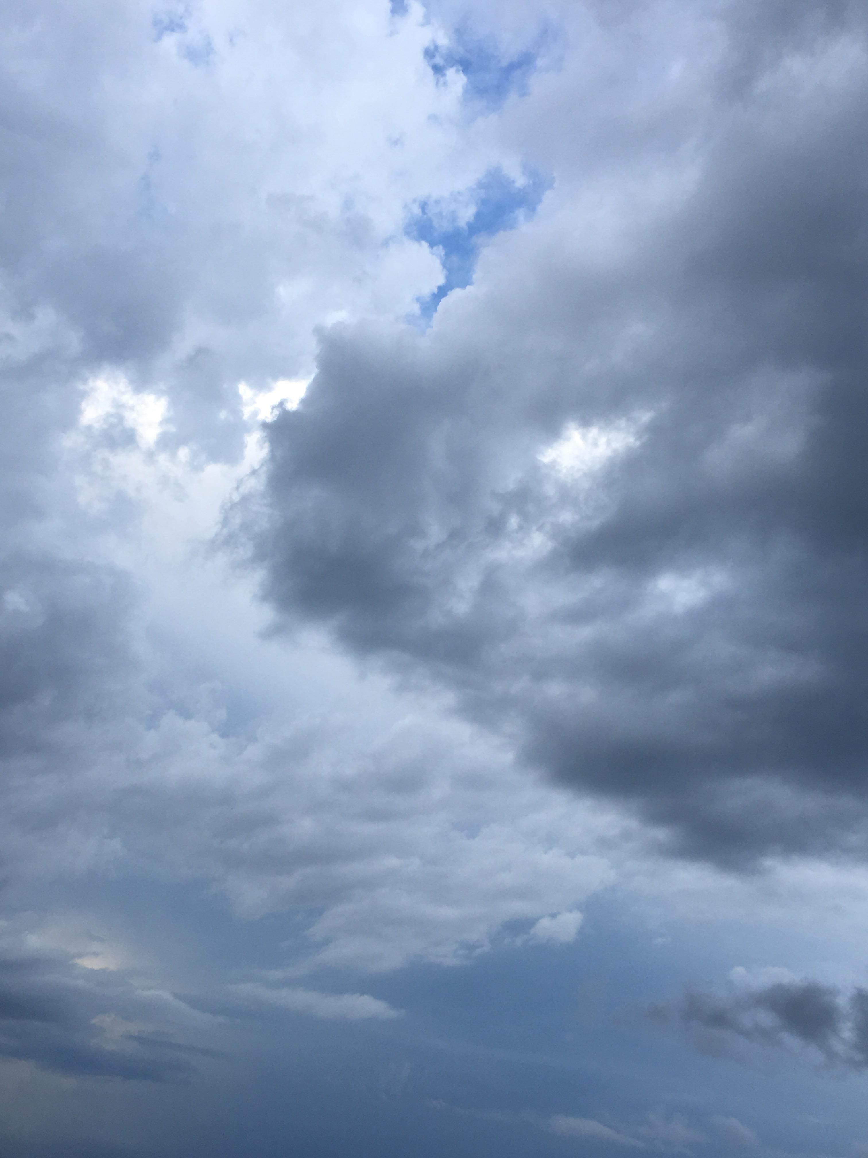 Dark and light clouds meet in Pine Island Corolla. | Scrolller