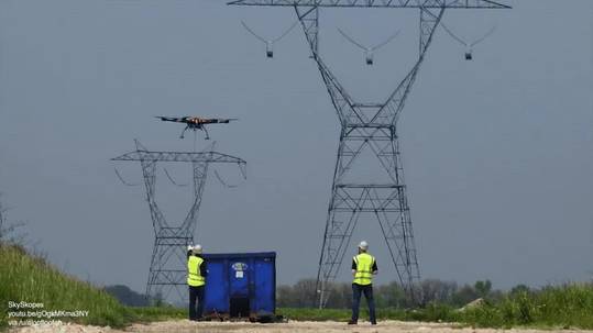 Drone stringing transmission lines | Scrolller