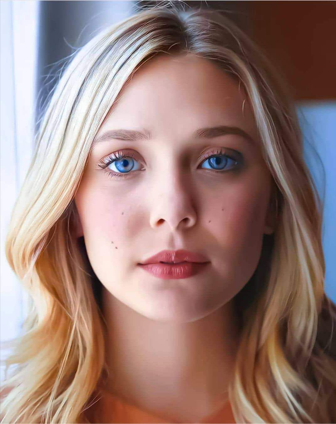 Elizabeth Olsen facial | Scrolller
