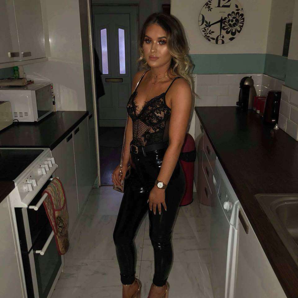 Emily posing in the kitchen | Scrolller