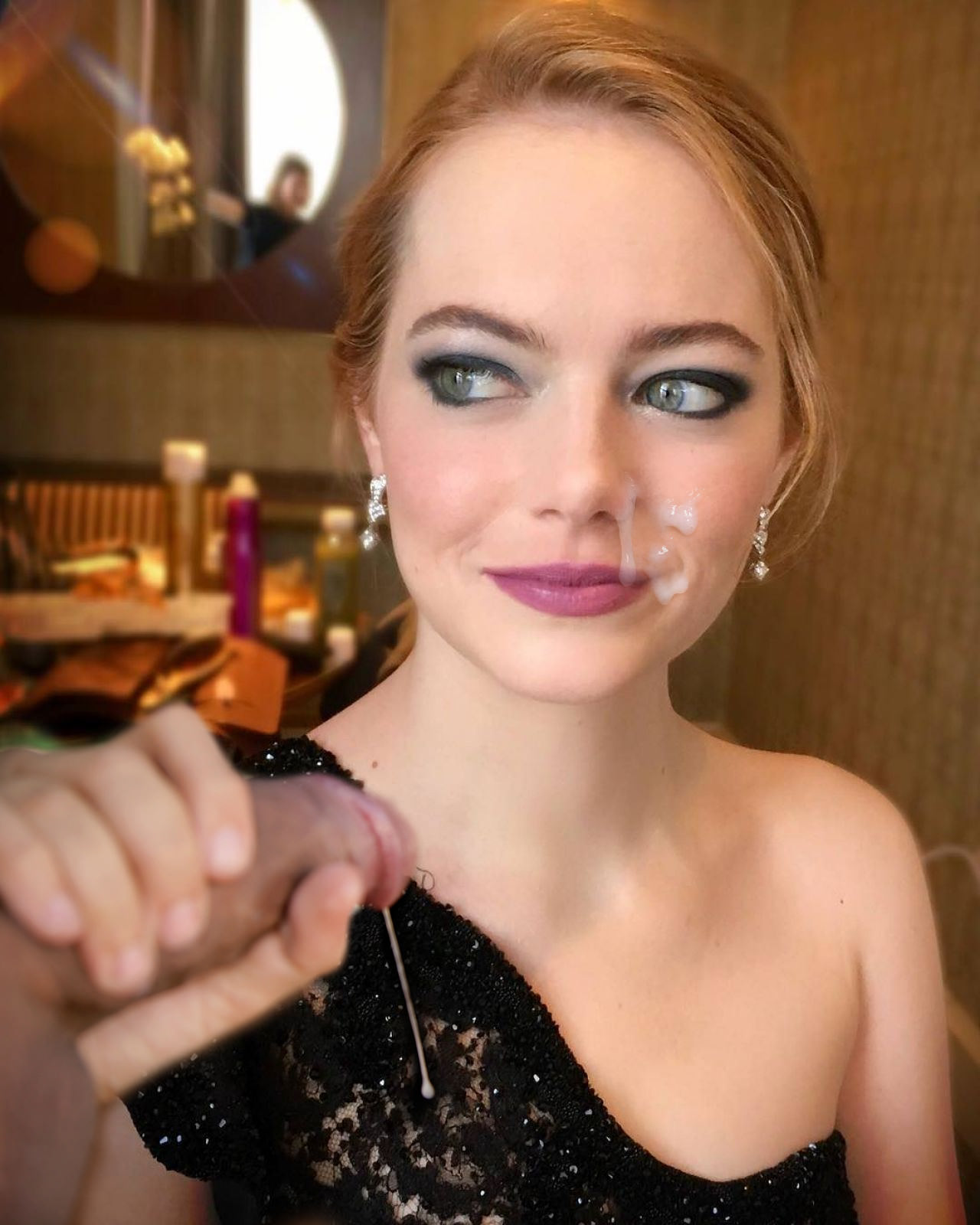 Emma Stone: At Golden Globes, backstage, retouching her make up | Scrolller