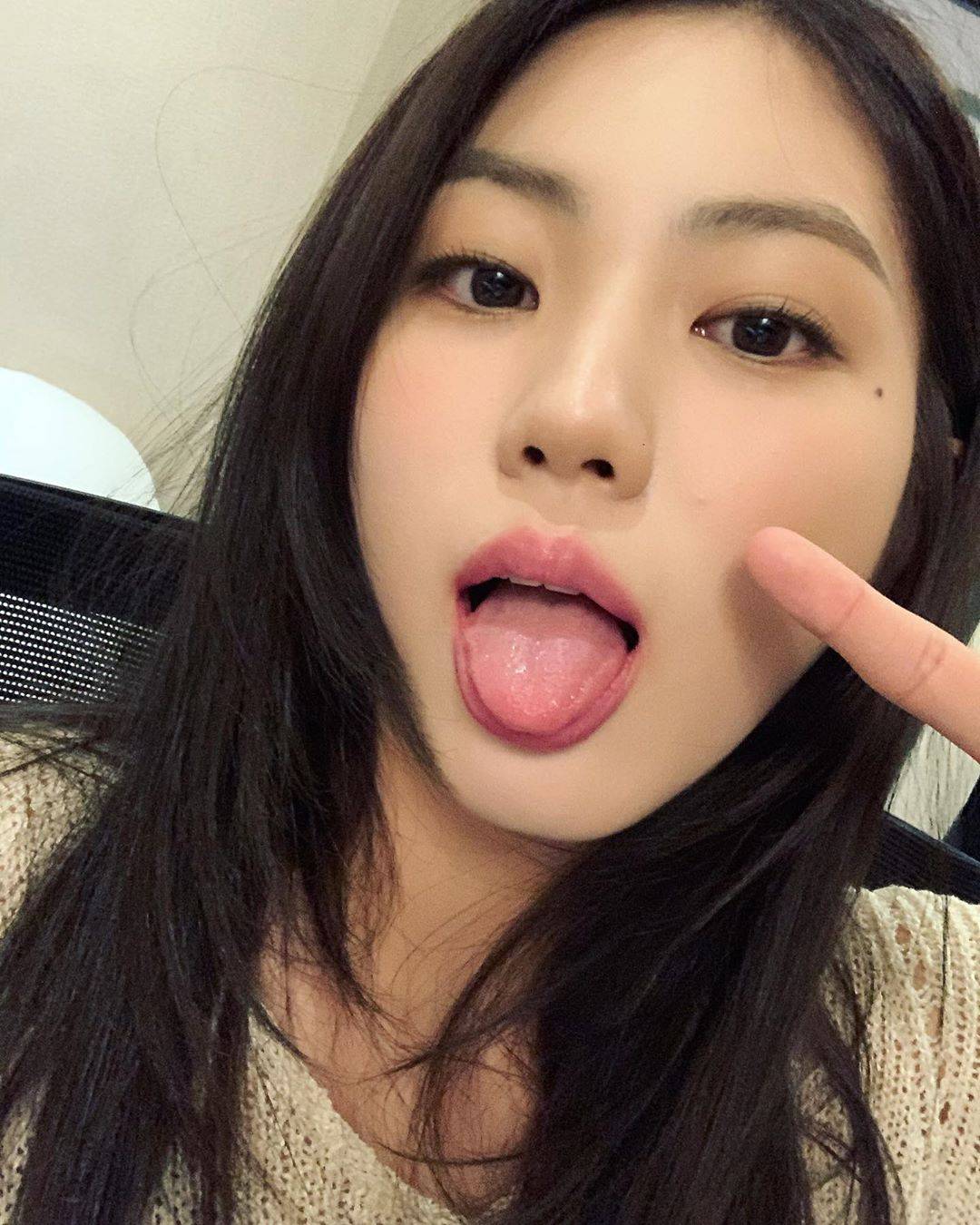 Showing tongue | Scrolller