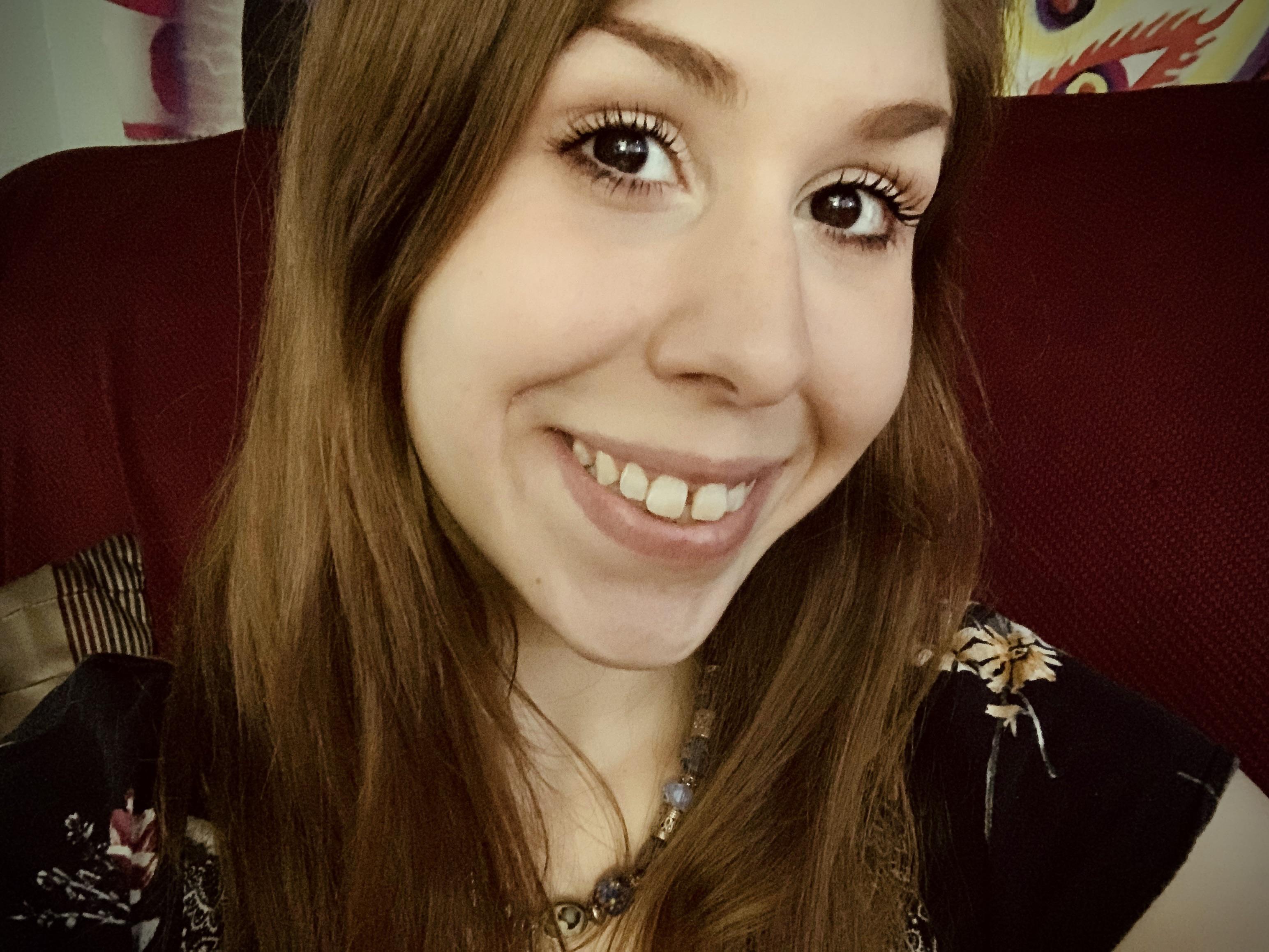 Feeling more confident smiling with my teeth showing! Trying to embrace the gap. 😊 | Scrolller