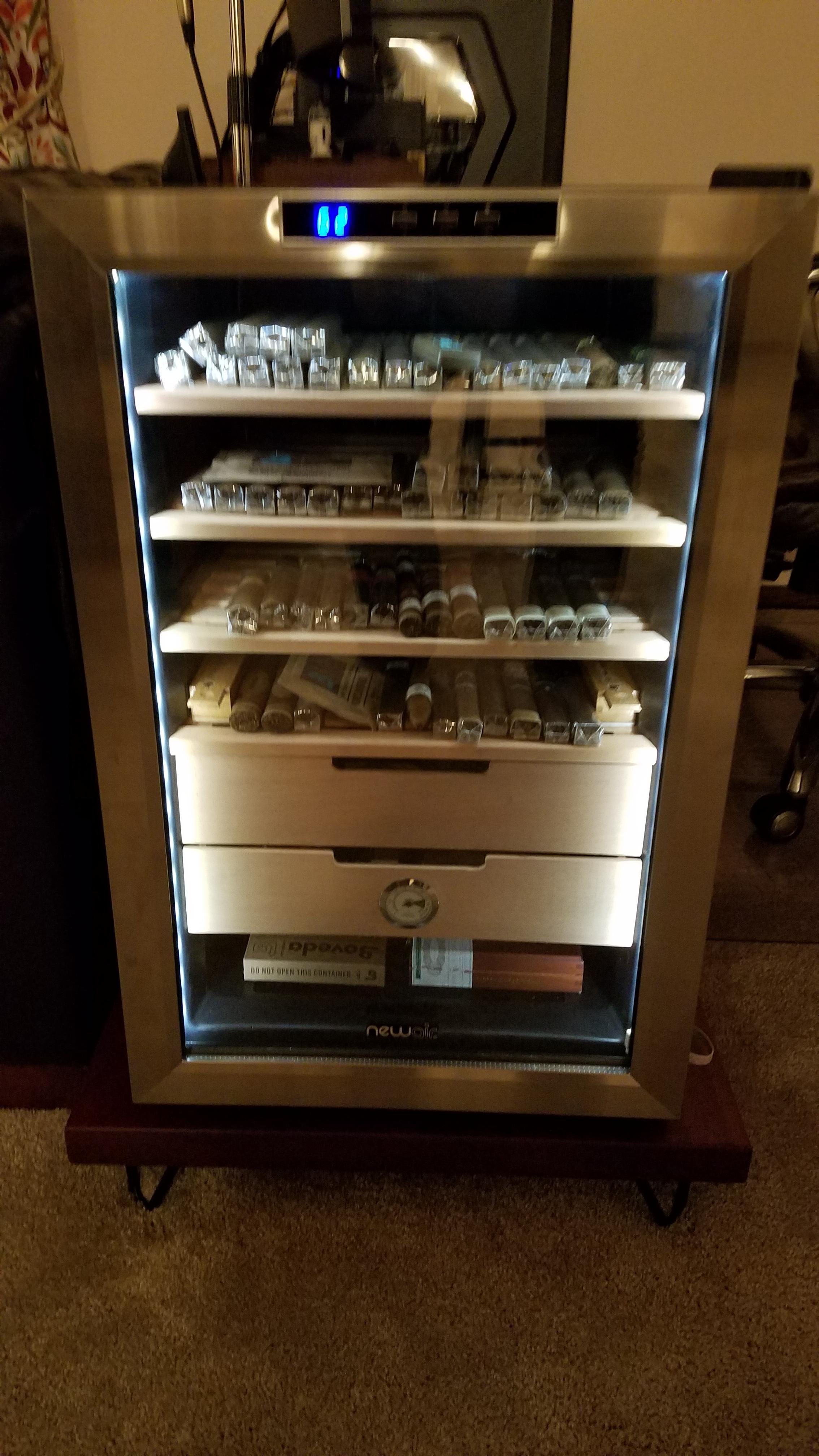 Finally finished by new coolidor with lights and a custom stand my friend and I made for it ...