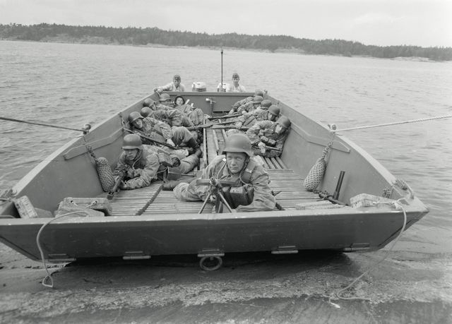 Finnish coastal infantry in 1962 with ex-Soviet Dp machine gun captured in WW2. | Scrolller