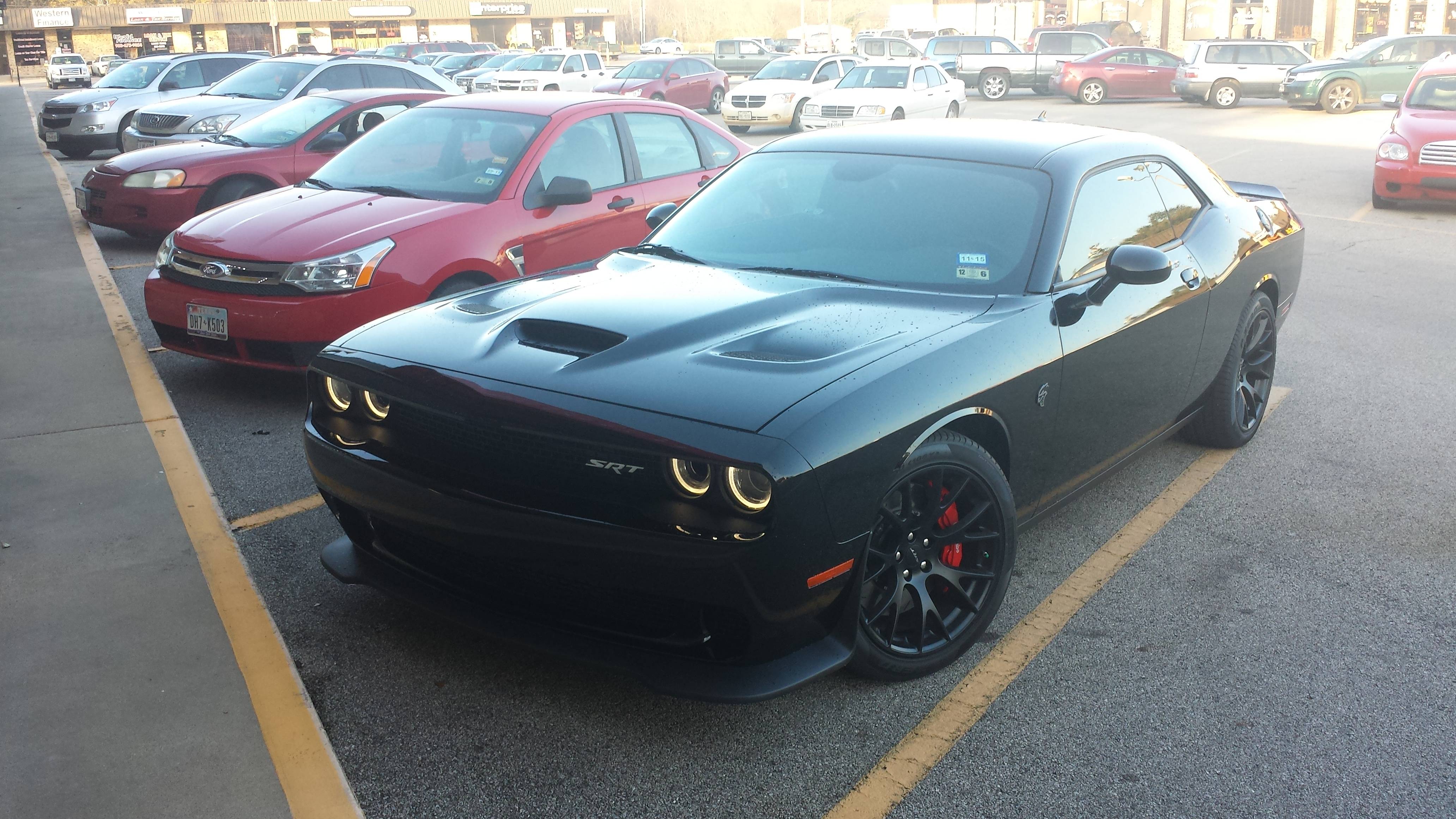 First Hellcat I've seen in person and it was actually out in the wild. Even had the 6 speed ...