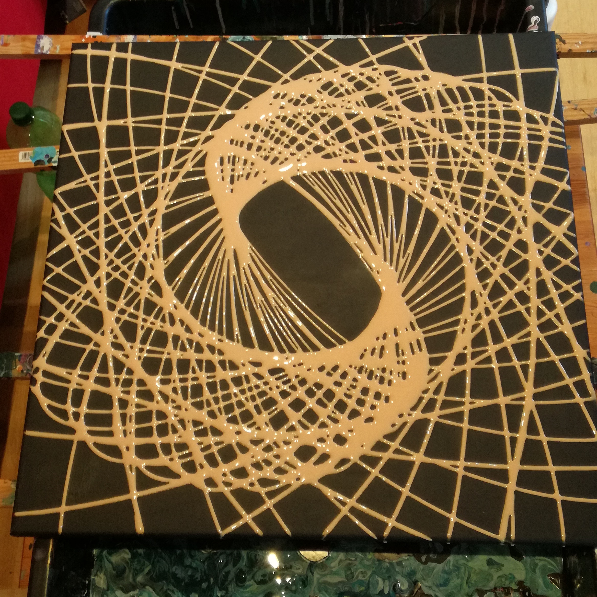 First time using a pendulum to make art, I'm excited for the dry result of my golden lines ...