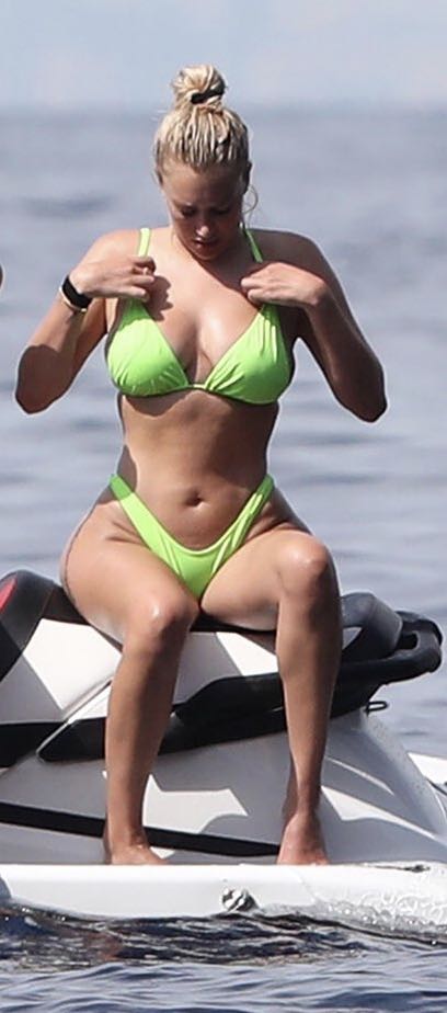 Fixing her top | Scrolller