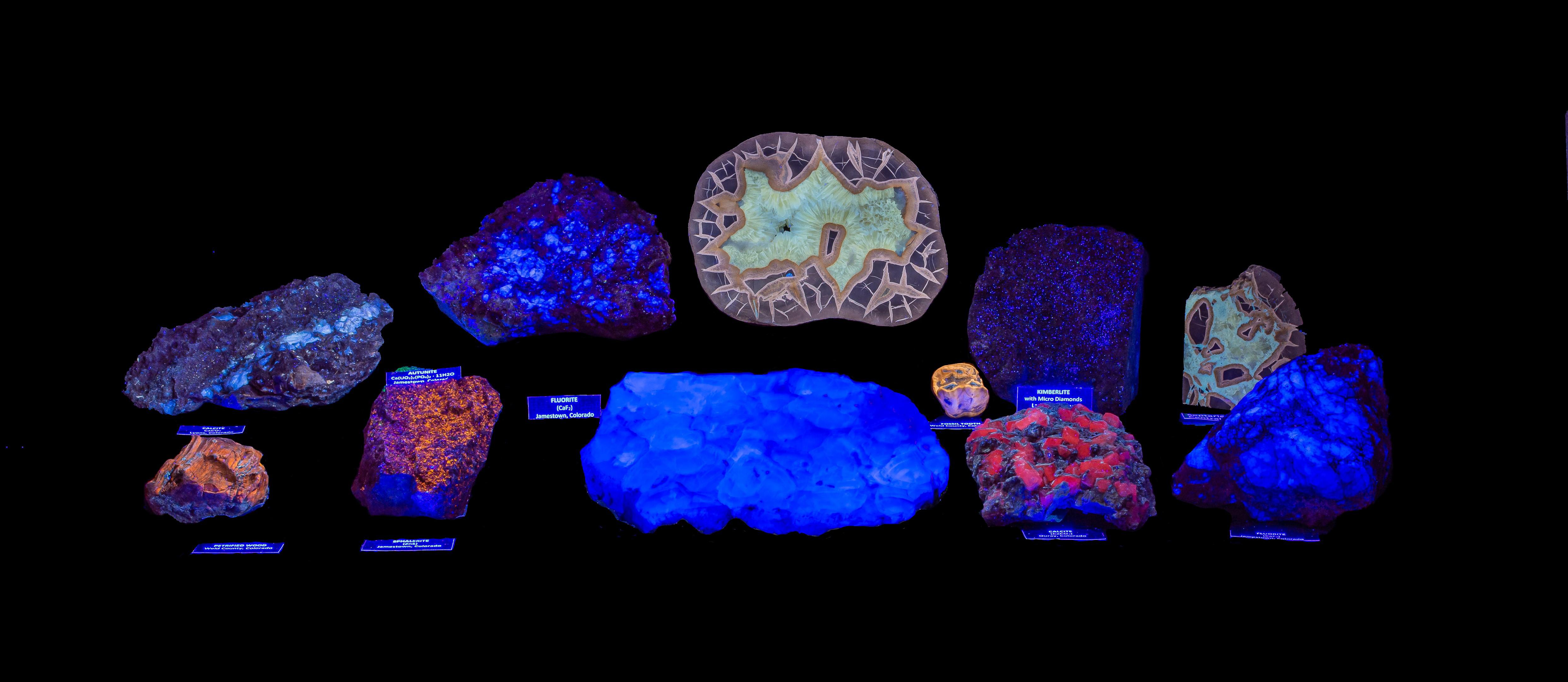 Fluorite Display at the 2019 Denver Gem & Mineral Show - Longwave UV | Scrolller