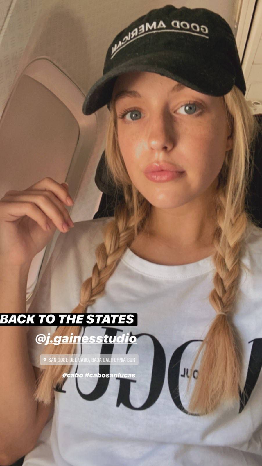 Gabby C Thomas - Vogue T-shirt and Black Cap | Scrolller