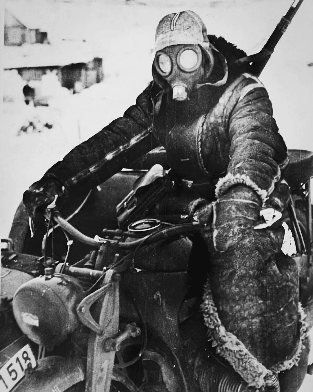 German motorcyclist in full winter gear, the motorcycle looks like a Zündapp, 1942. | Scrolller