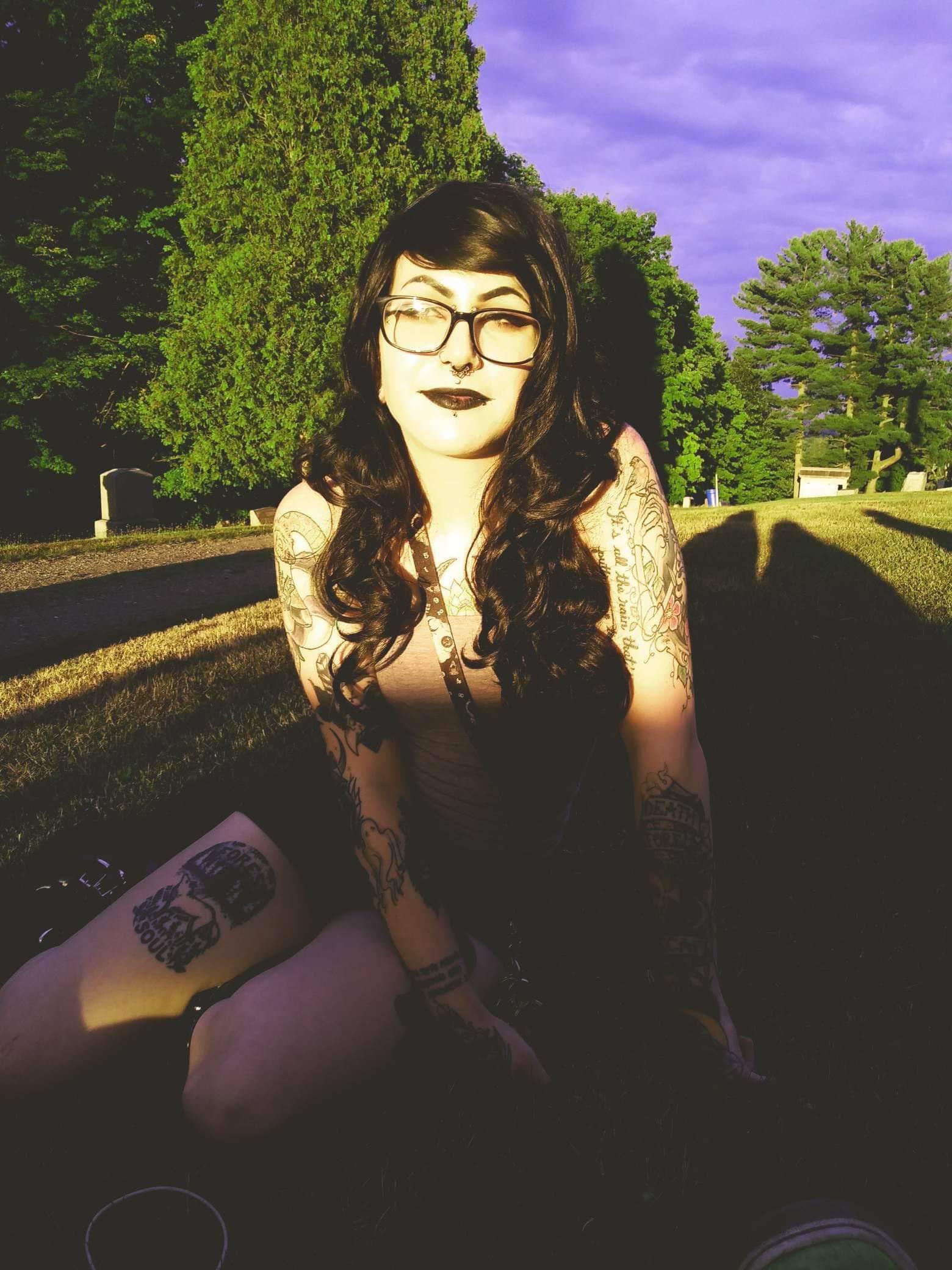 Goth girl hangs out in cemetery | Scrolller