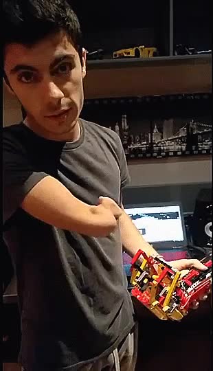 Guy builds his own prosthetic arm using Lego. | Scrolller