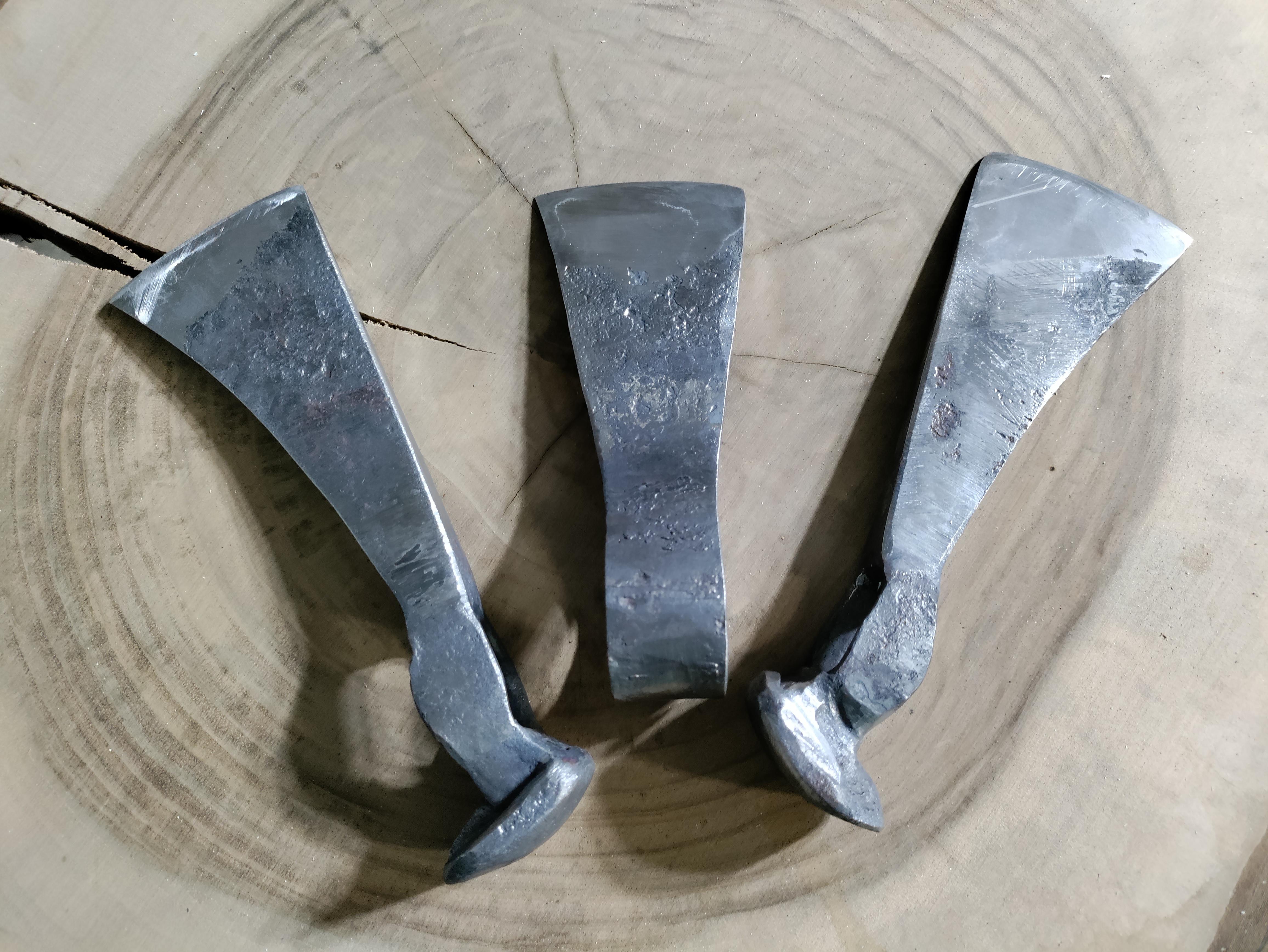 Hand forged axes | Scrolller