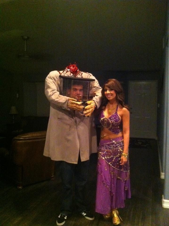 Headless man in fish tank costume. | Scrolller